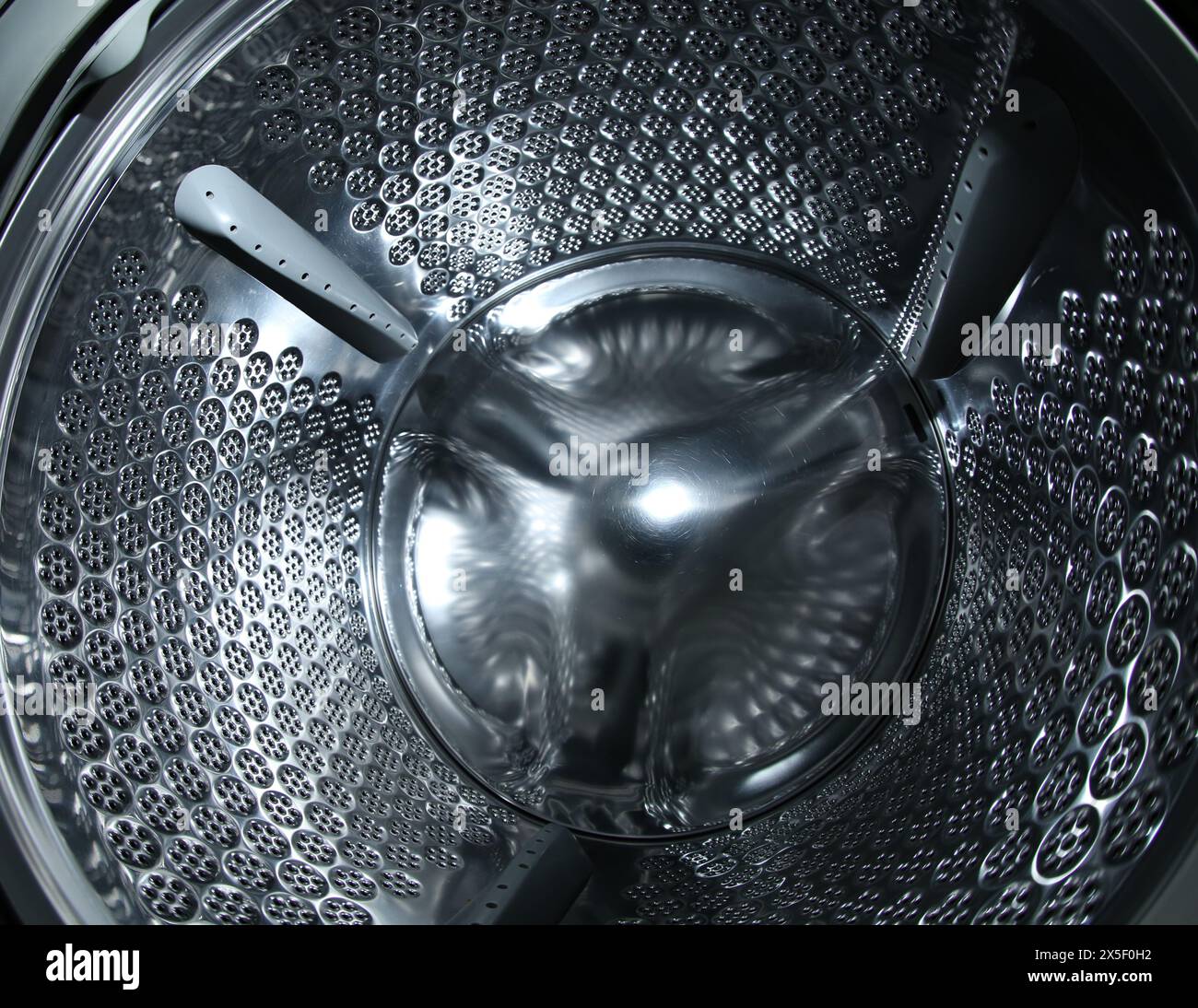 Empty washing machine drum, closeup view. Laundry day Stock Photo - Alamy