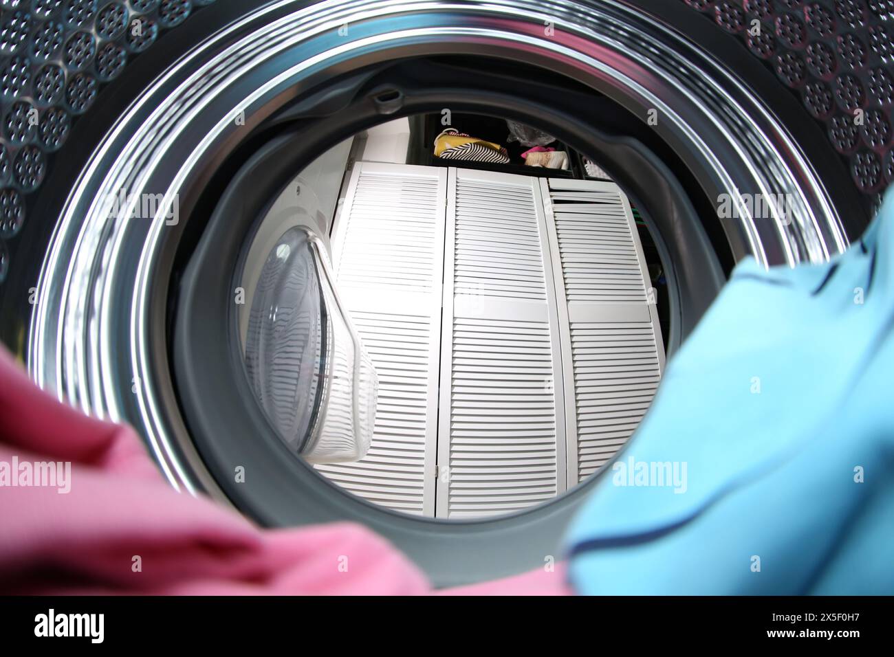 Clothes in washing machine indoors, view from inside. Laundry day Stock ...