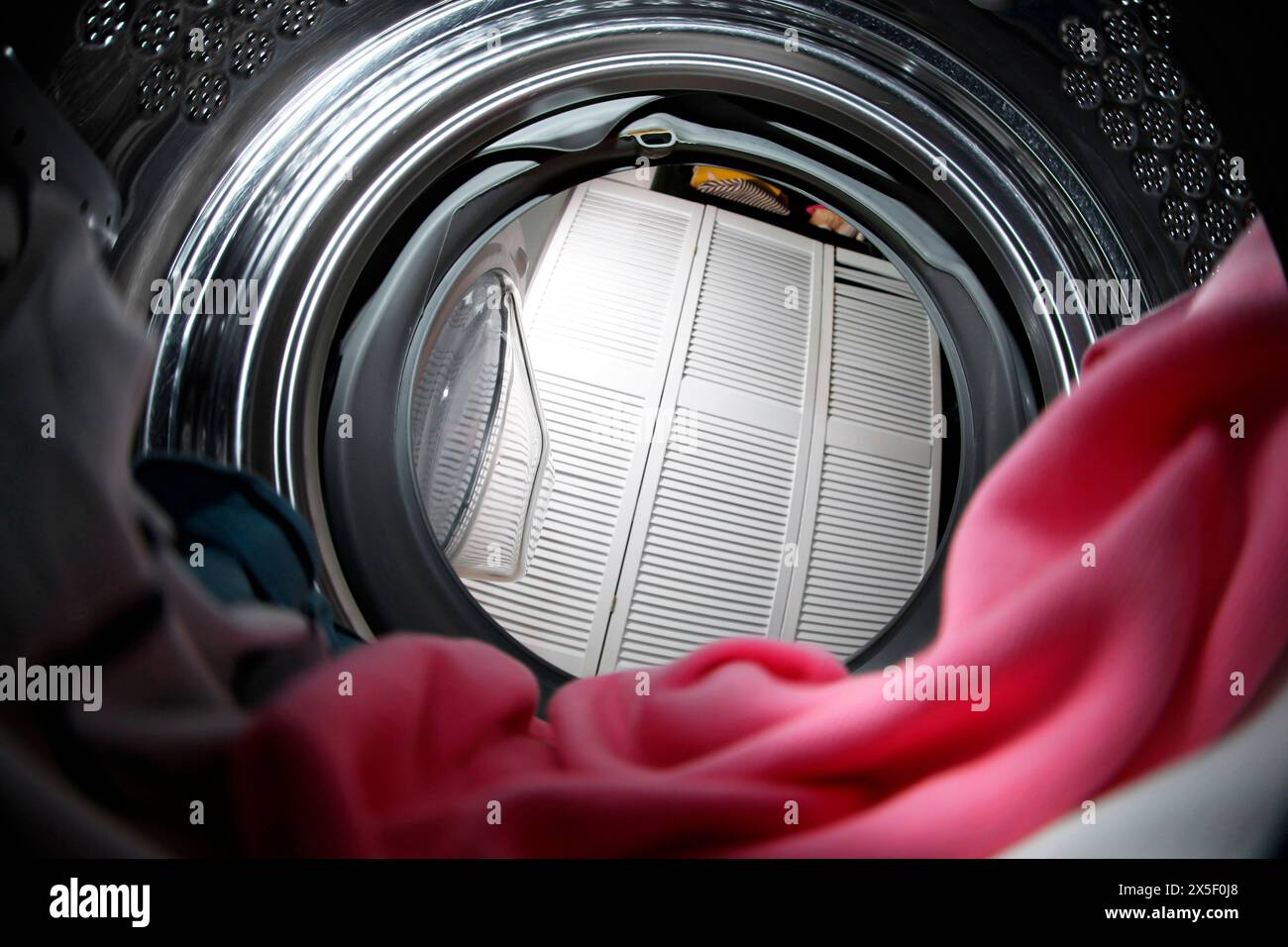 Clothes in washing machine indoors, view from inside. Laundry day Stock ...
