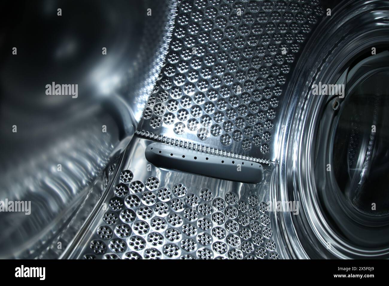 Empty washing machine drum, closeup view. Laundry day Stock Photo - Alamy