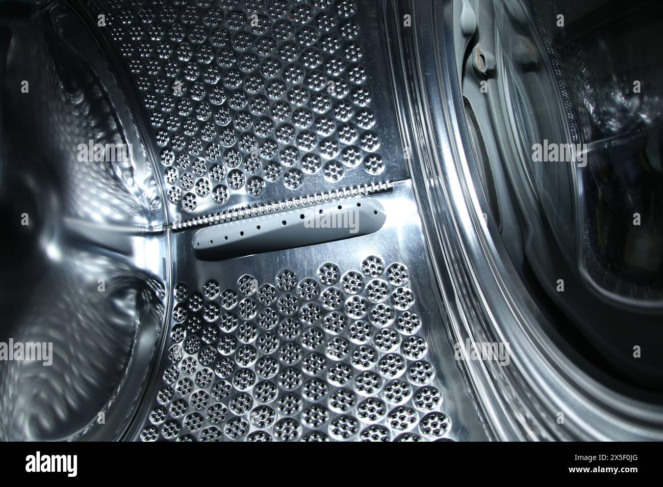 Empty washing machine drum, closeup view. Laundry day Stock Photo - Alamy