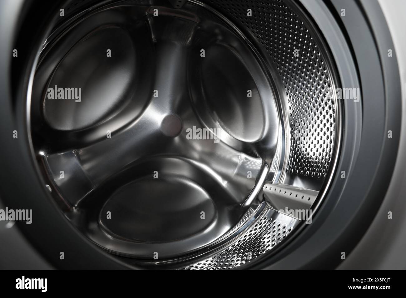 Empty washing machine drum, closeup. Laundry day Stock Photo - Alamy