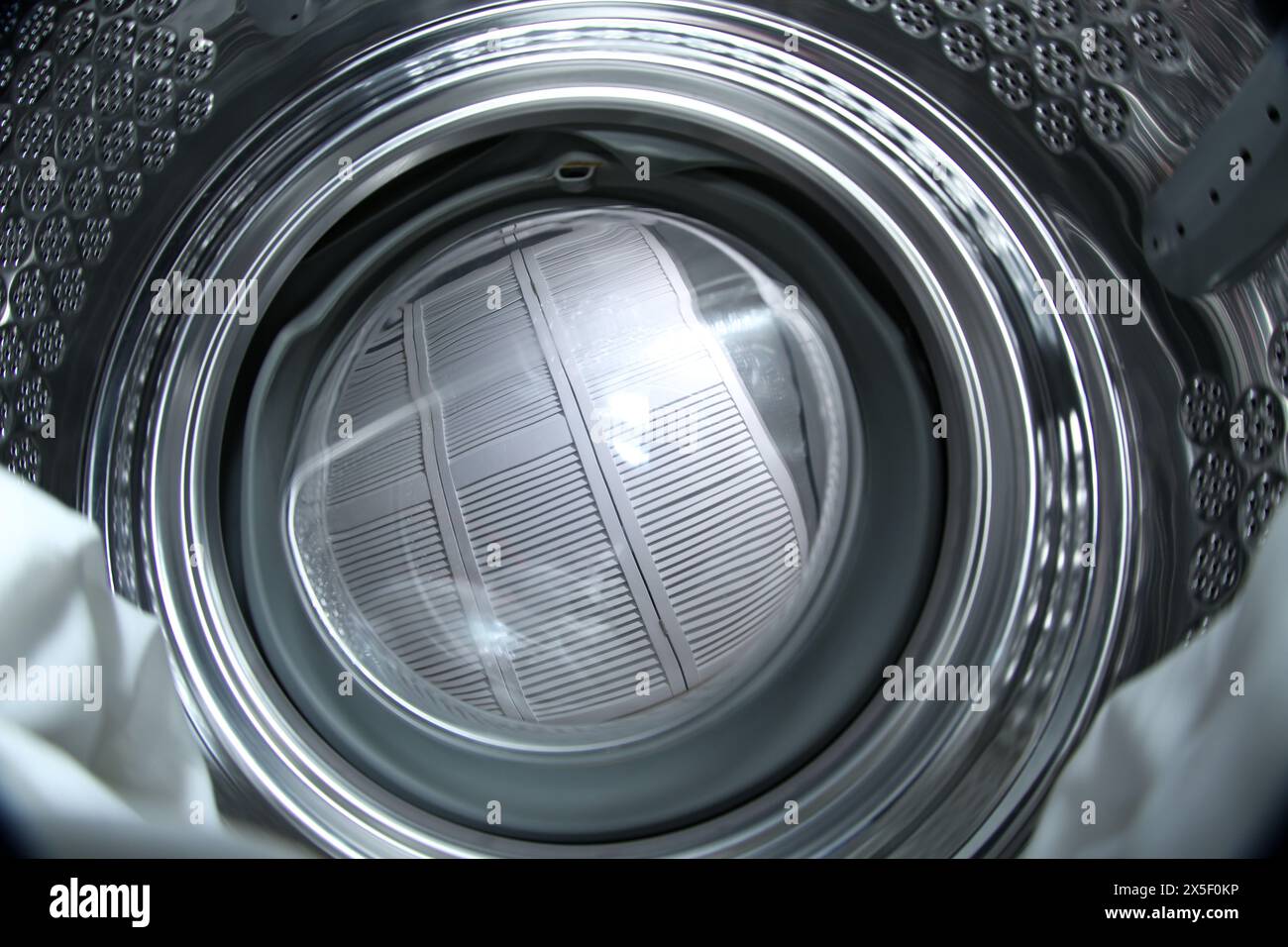 Clothes in washing machine indoors, view from inside. Laundry day Stock ...