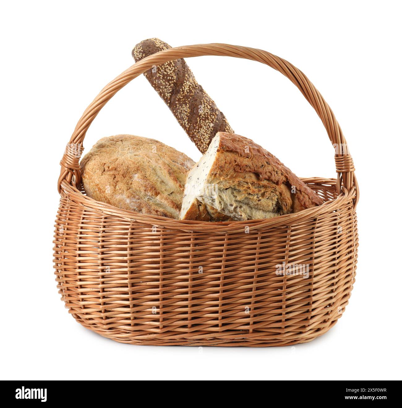 Wicker basket with different types of fresh bread isolated on white ...