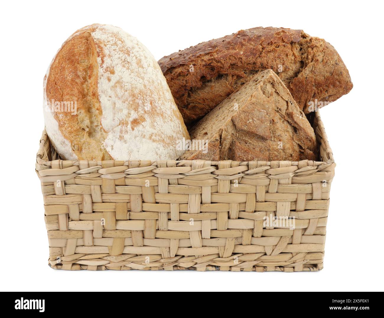 Basket with different types of fresh bread isolated on white Stock ...