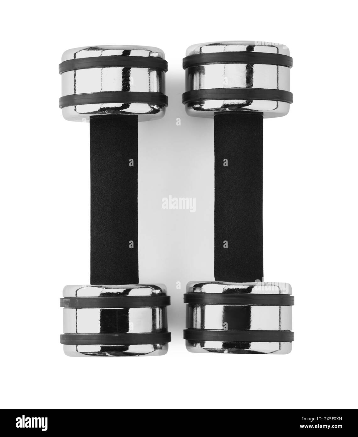 Metal dumbbells isolated on white, top view. Sports equipment Stock ...