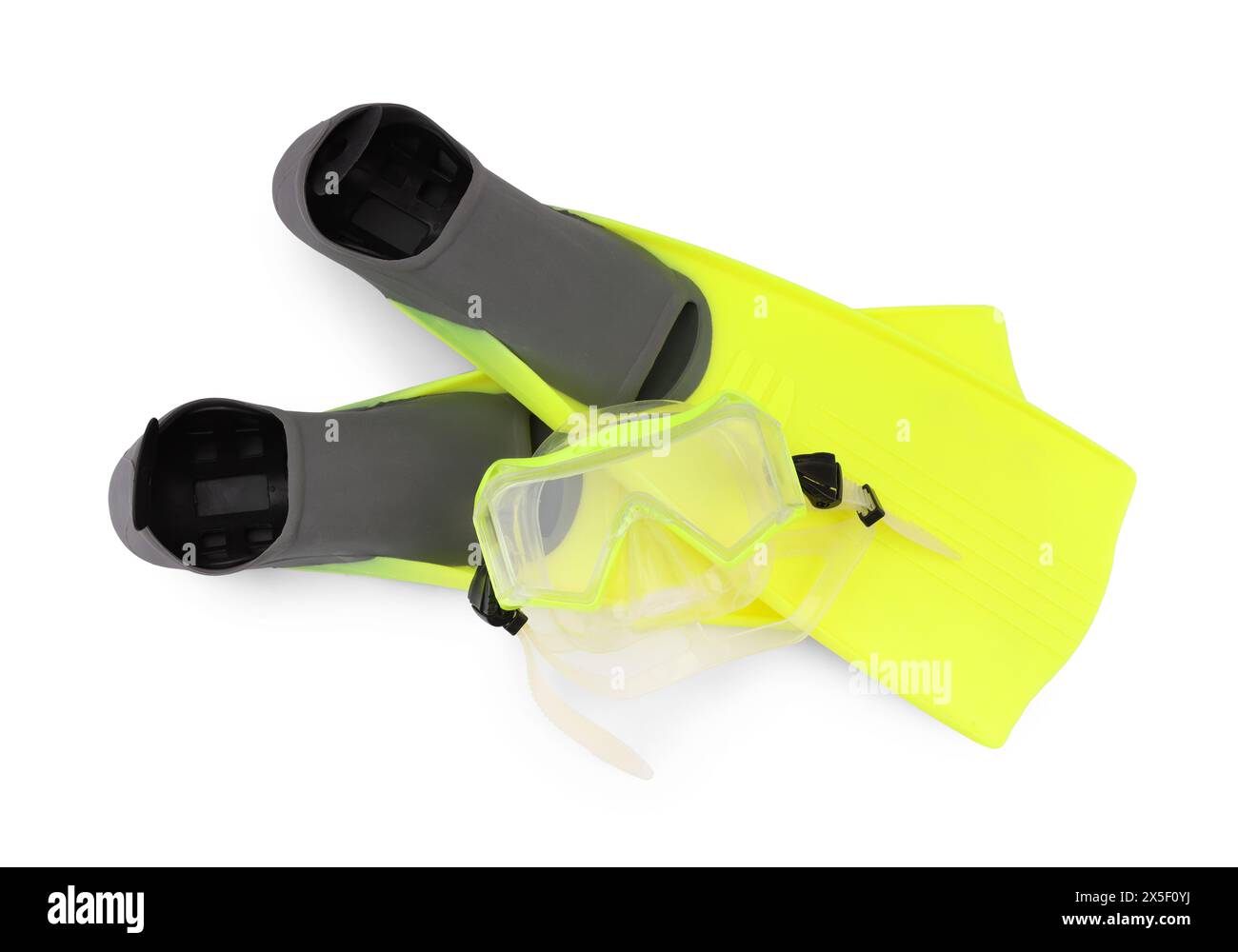 Pair of yellow flippers and diving mask isolated on white, top view ...