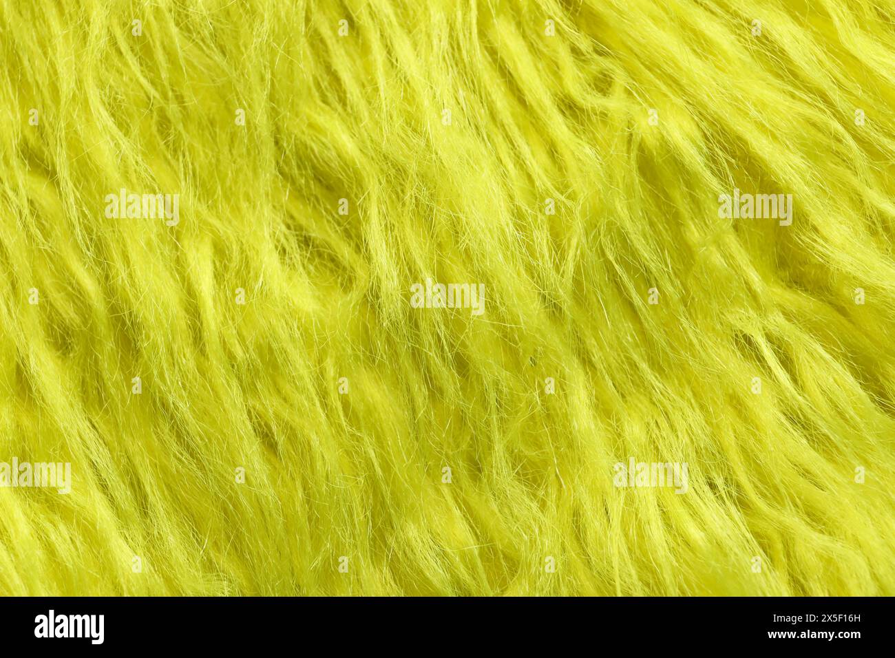 Texture of yellow faux fur as background, closeup Stock Photo - Alamy