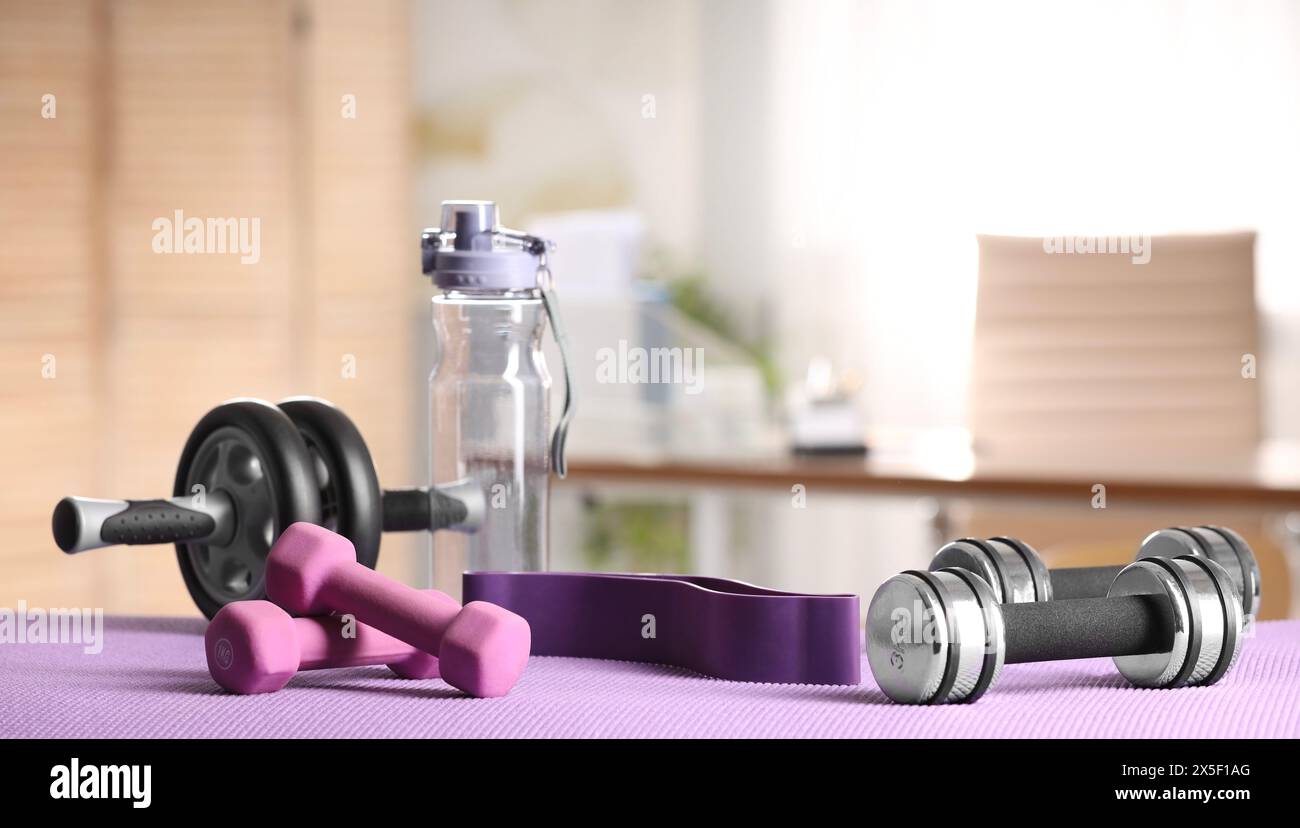 Many different sports equipment on mat indoors, banner design Stock ...