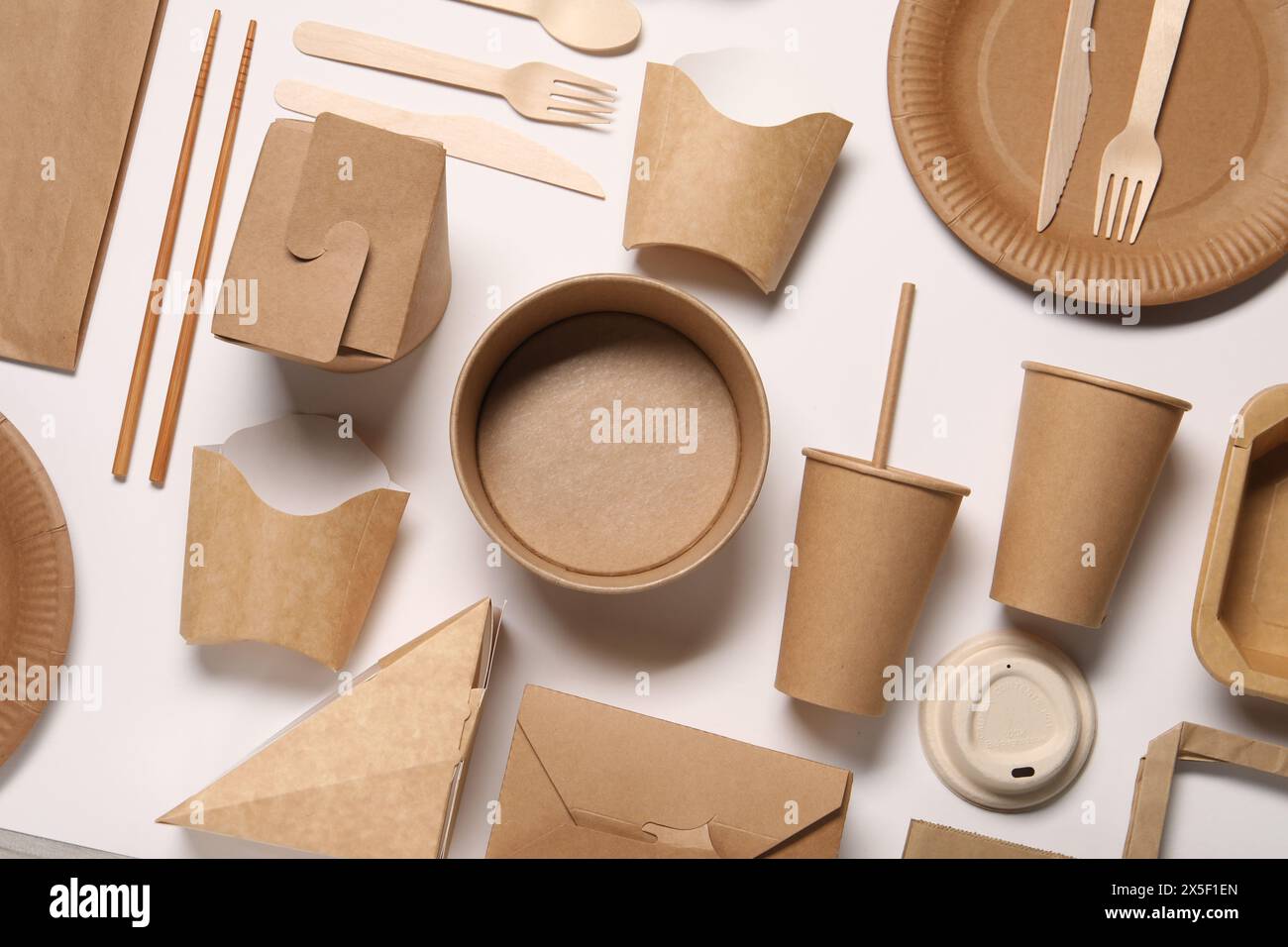 Flat lay composition with eco friendly food packagings on white ...