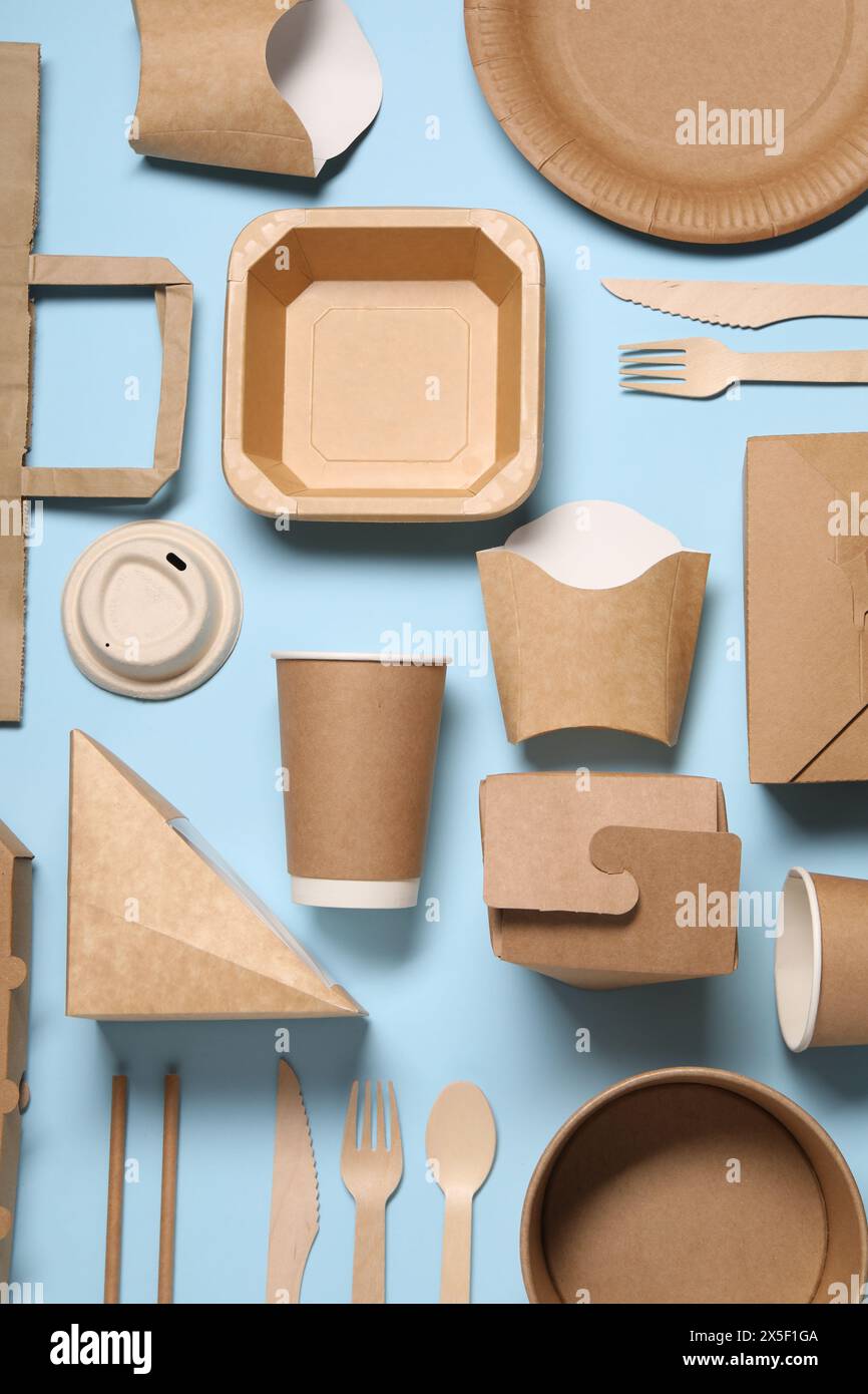 Flat lay composition with eco friendly food packagings on light blue ...