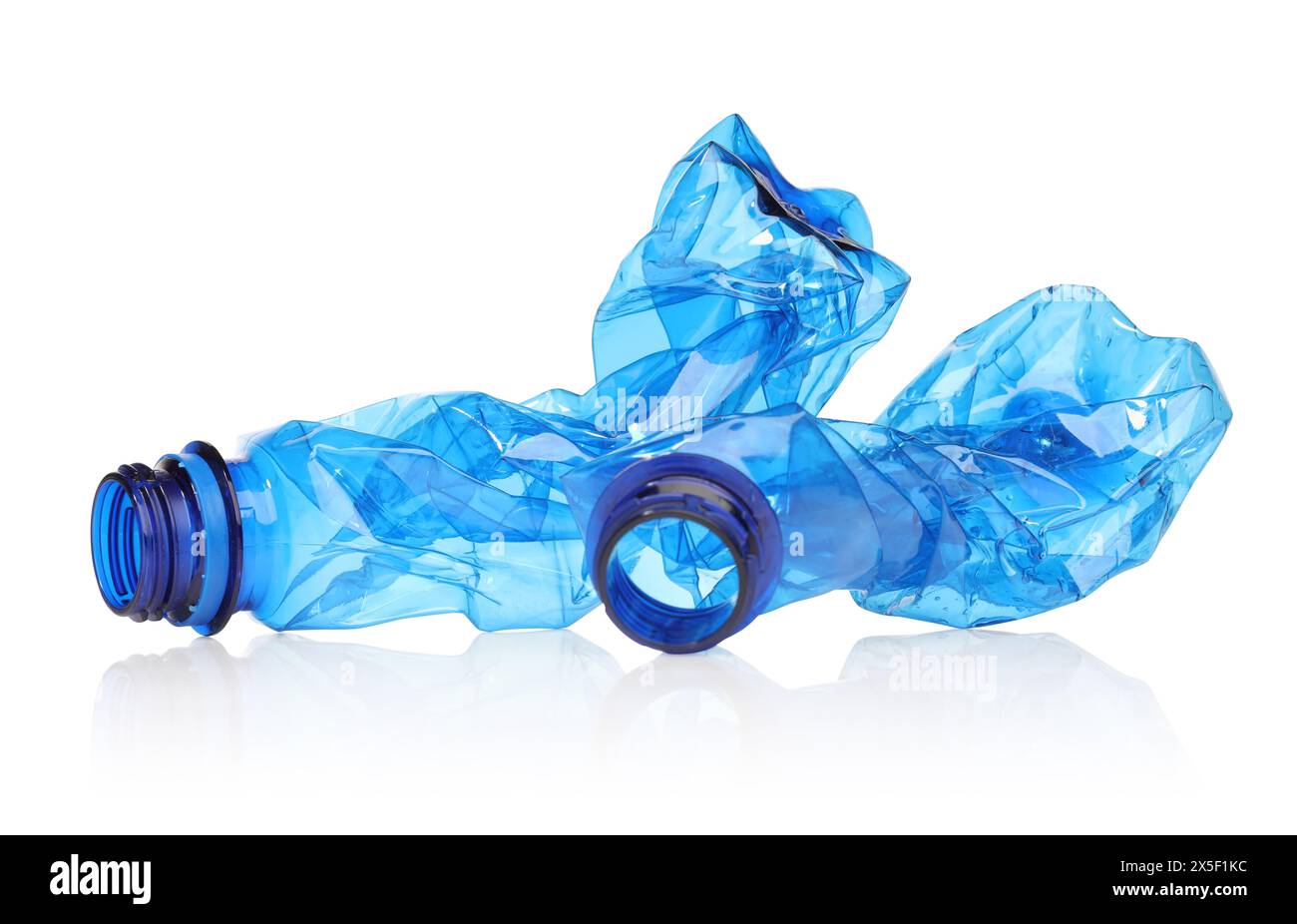 Crumpled disposable plastic bottles isolated on white Stock Photo - Alamy