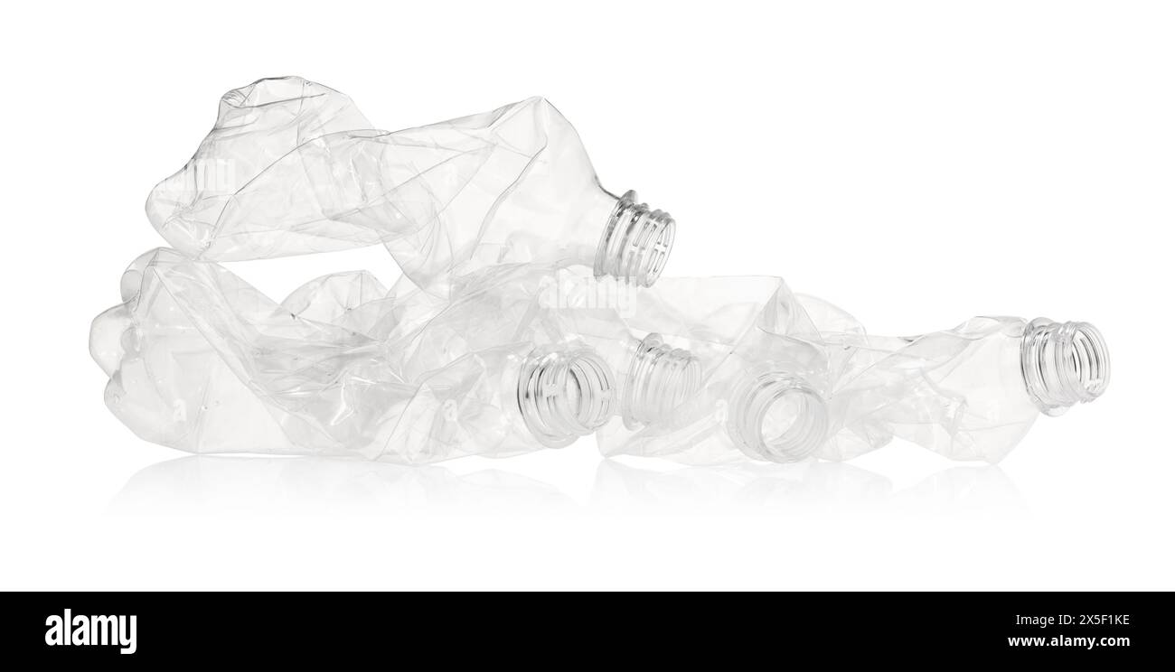 Crumpled disposable plastic bottles isolated on white Stock Photo - Alamy