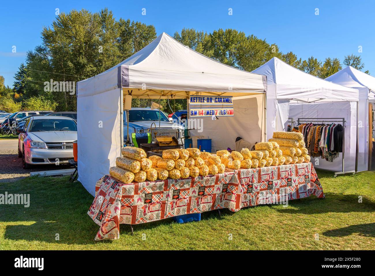 A popcorn kettle corn and caramel popcorn tent and kiosk at an Autumn ...