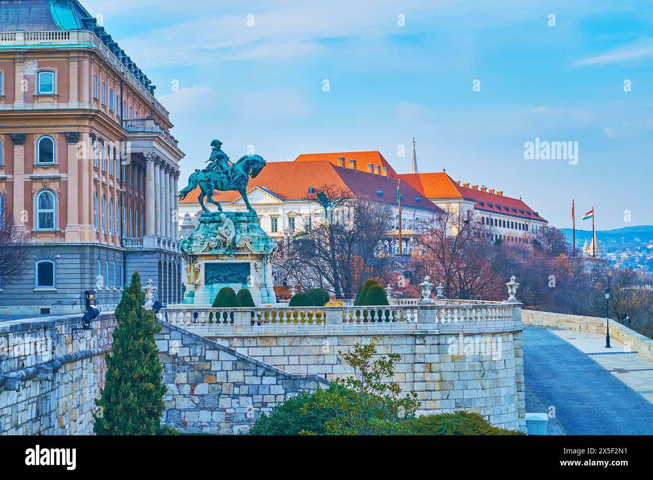 The bronze equestrian statue of Eugene of Savoy at Buda Castle with red ...