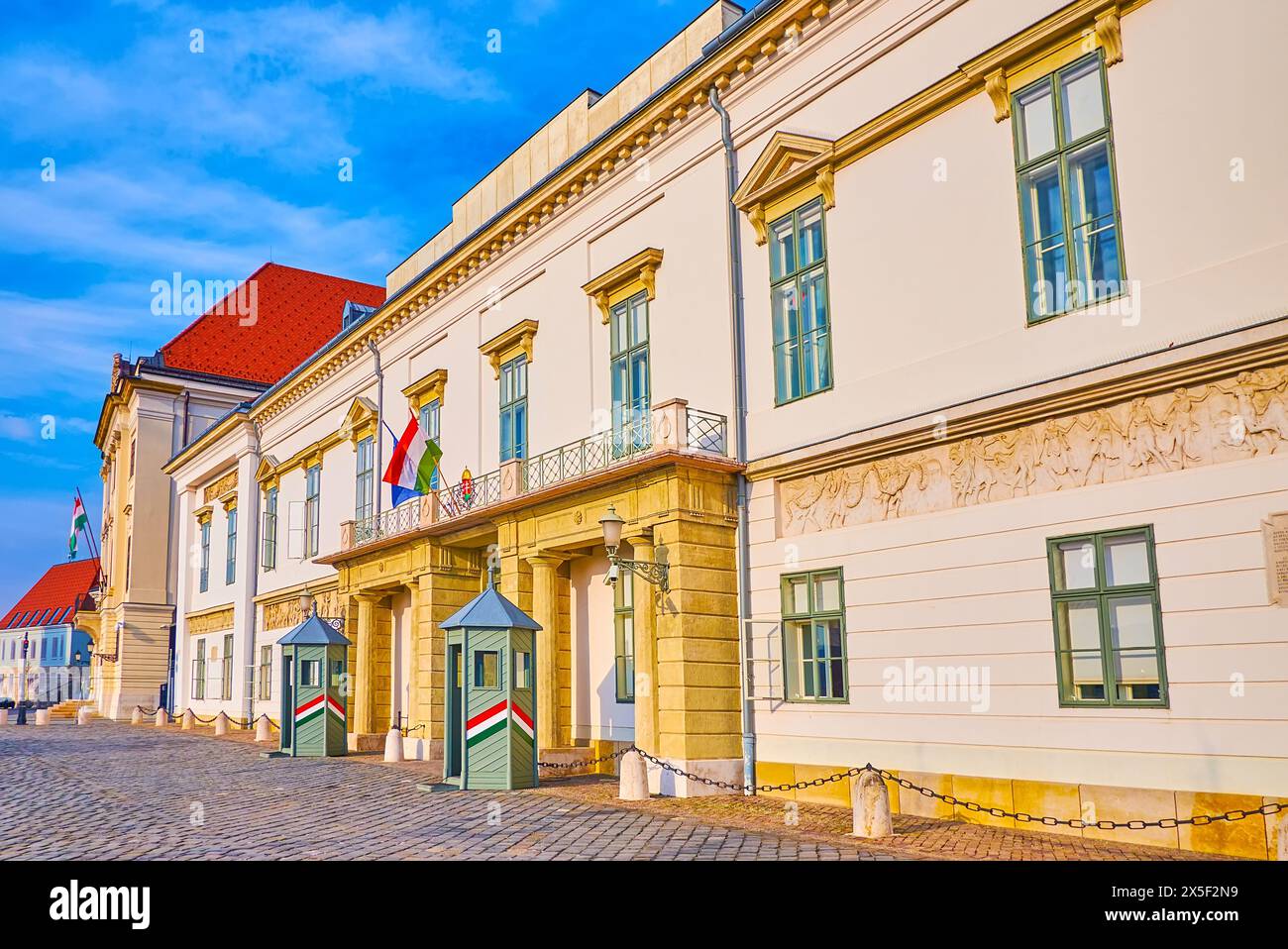 The facade of Sandor Palace (Presidential Palace) with guard booths in ...