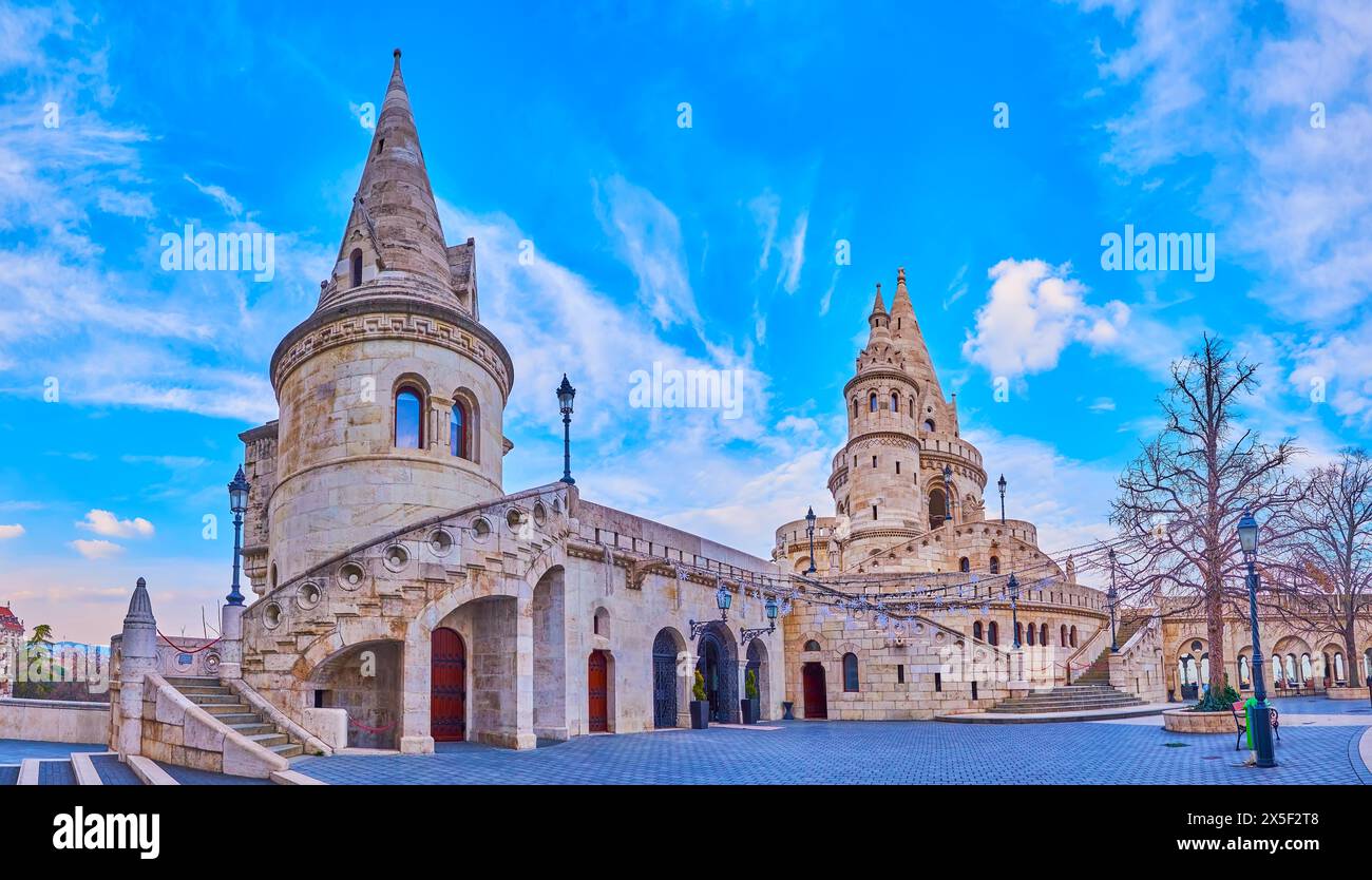 The stone towers of Fisherman's Bastion in Budapest, Hungary, evoke a ...