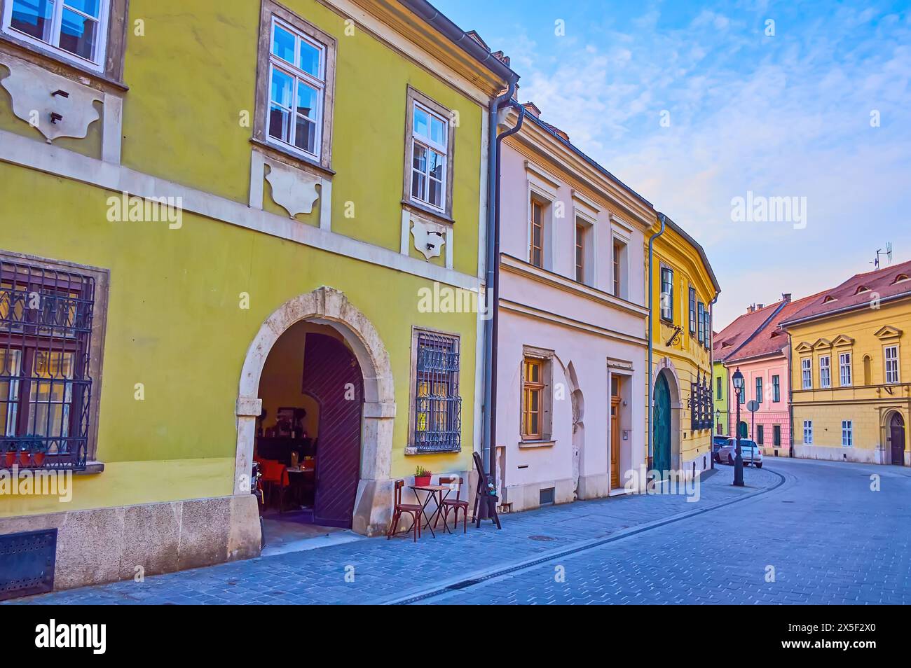 The arched door of the medieval house leads to the tavern, Tncsics ...