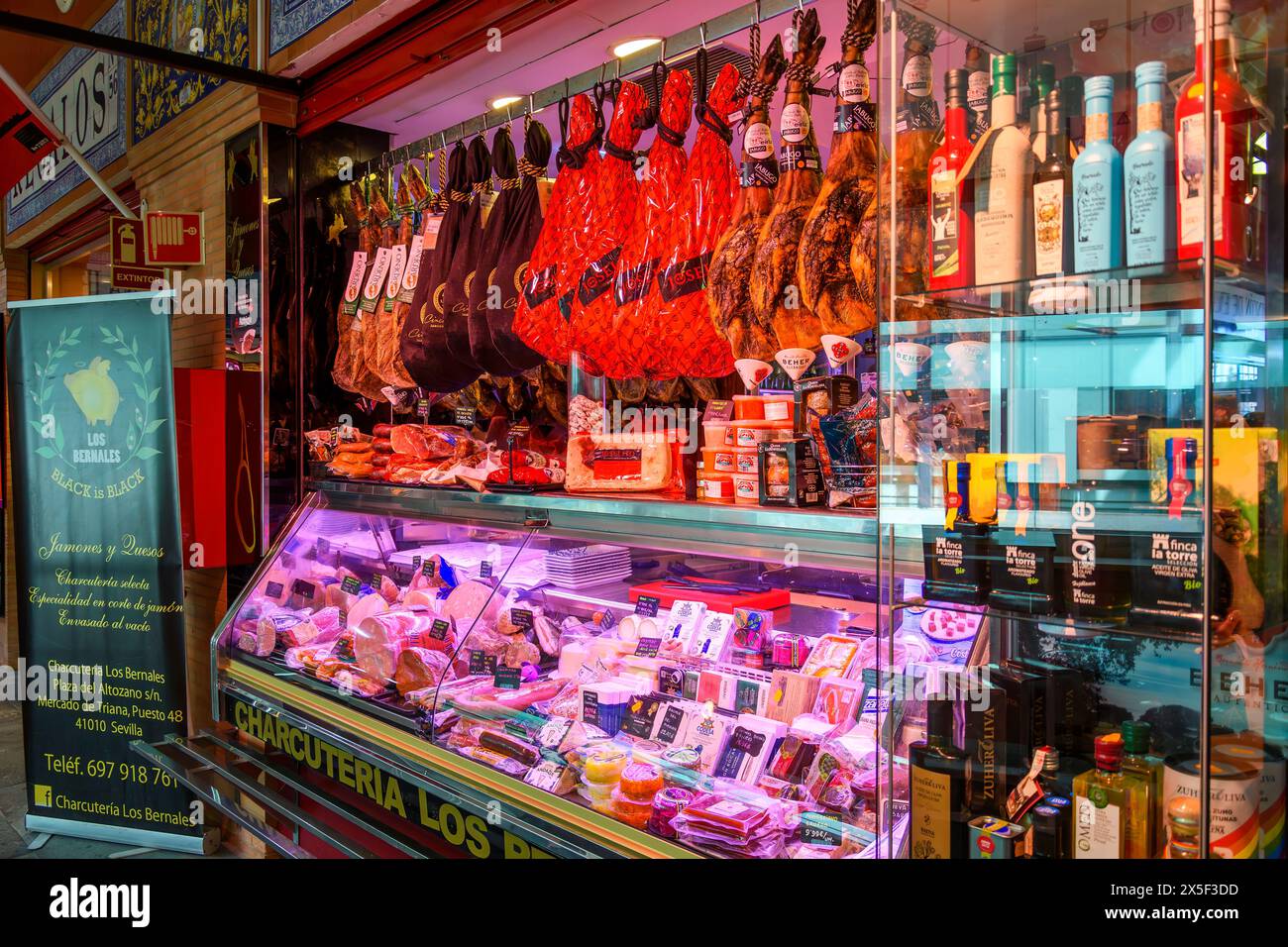 Inside the Mercado Triana market full of grocers, butchers and gourmet ...