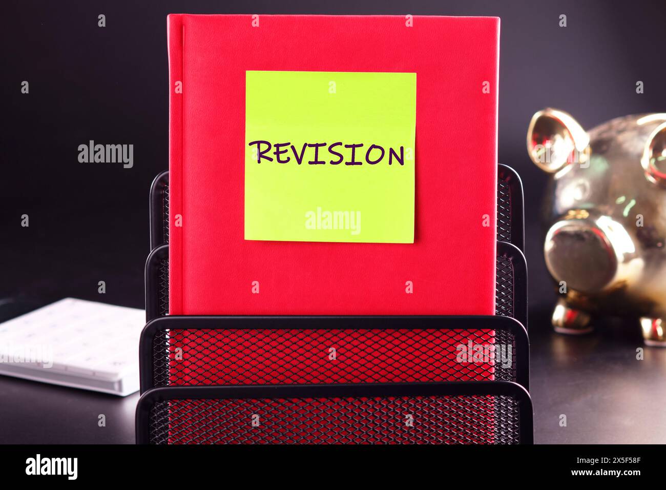 Conceptual revision symbol. REVISION word written on a yellow sticker ... Conceptual revision symbol. REVISION word written on a yellow sticker ...