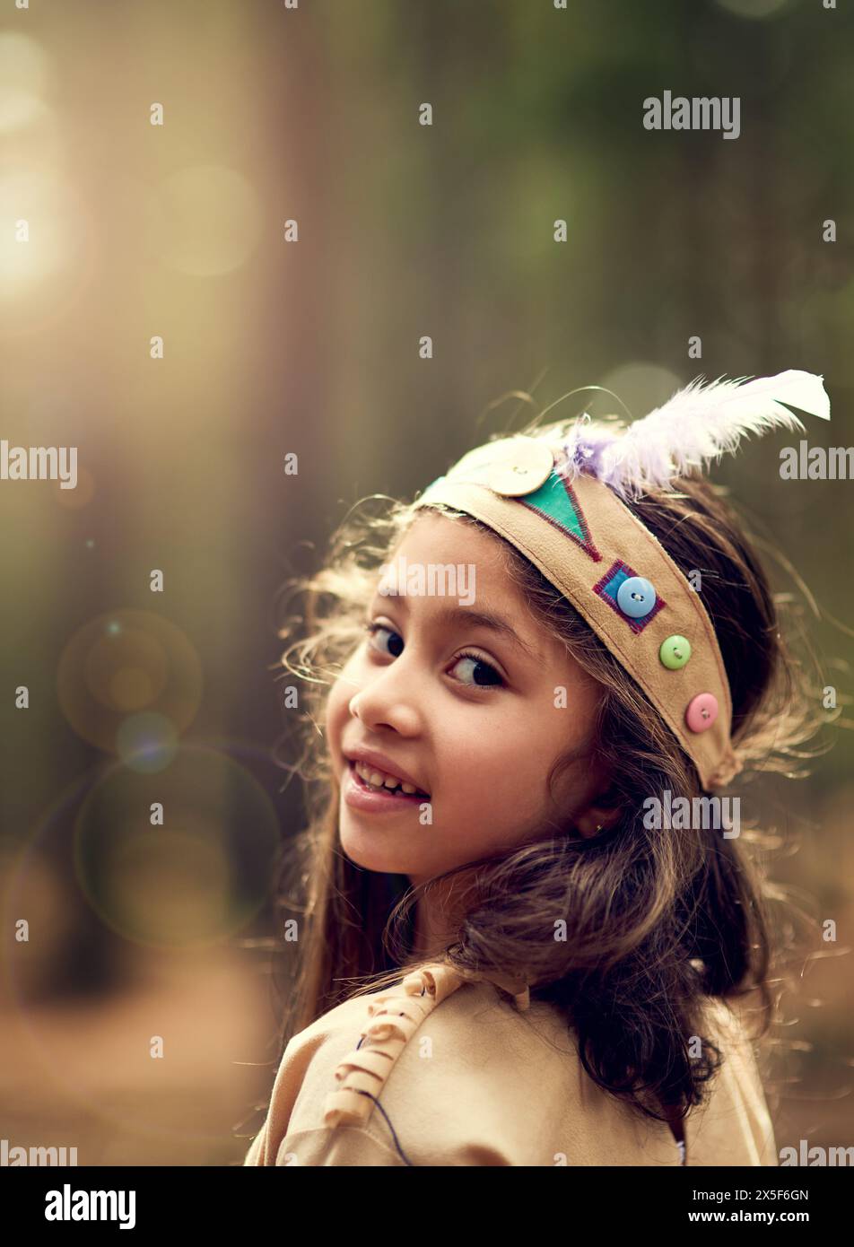 Portrait, forest and child in Native American costume with nature ...