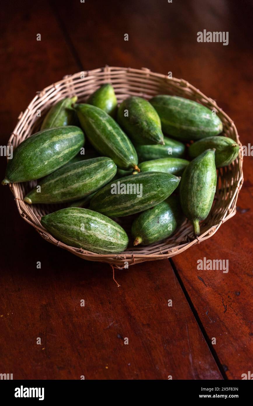 Pointed gourd or potol, an Indian vegetable in a basket Stock Photo - Alamy