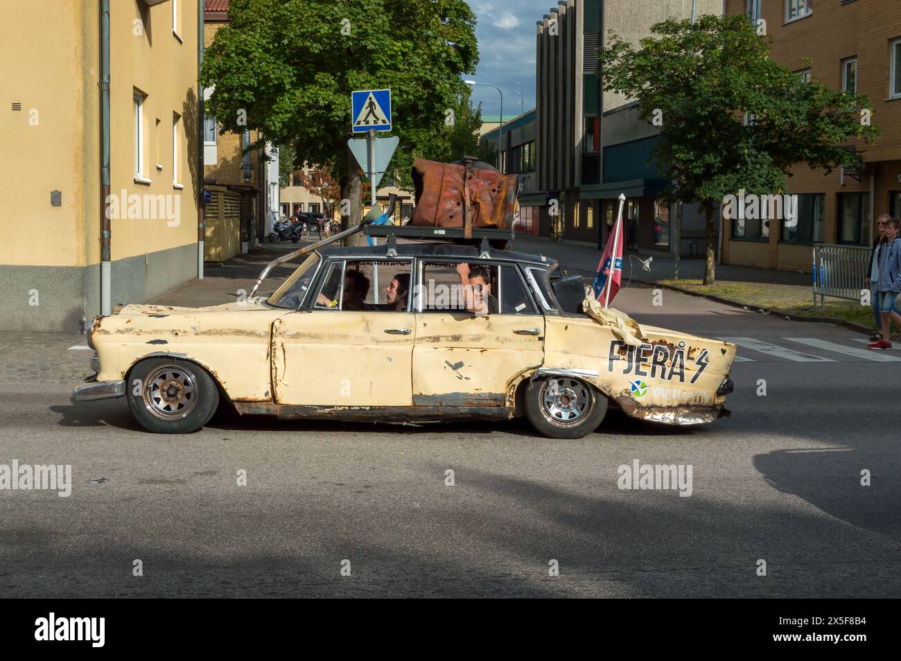 Old wrecked mercedes benz on wheels and wings cruising Stock Photo - Alamy