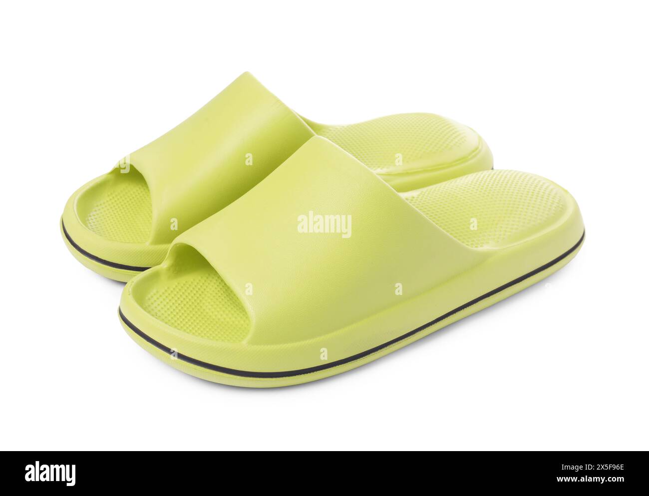 Pair of green rubber slippers isolated on white Stock Photo - Alamy