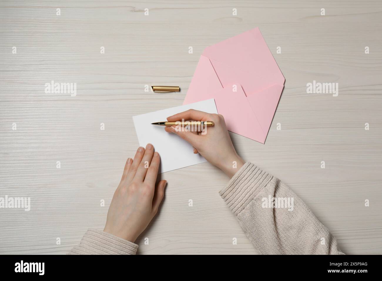 Woman writing letter hi-res stock photography and images - Alamy