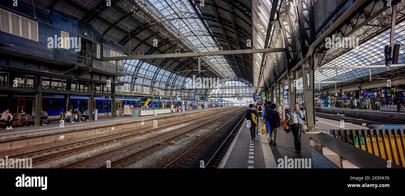 Central train station of Dutch railroad in capital city with large tube ...
