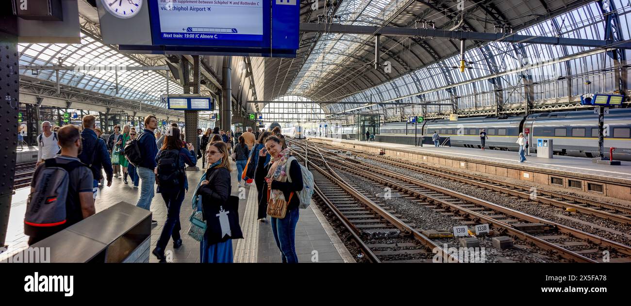 Central train station of Dutch railroad in capital city with large tube ...