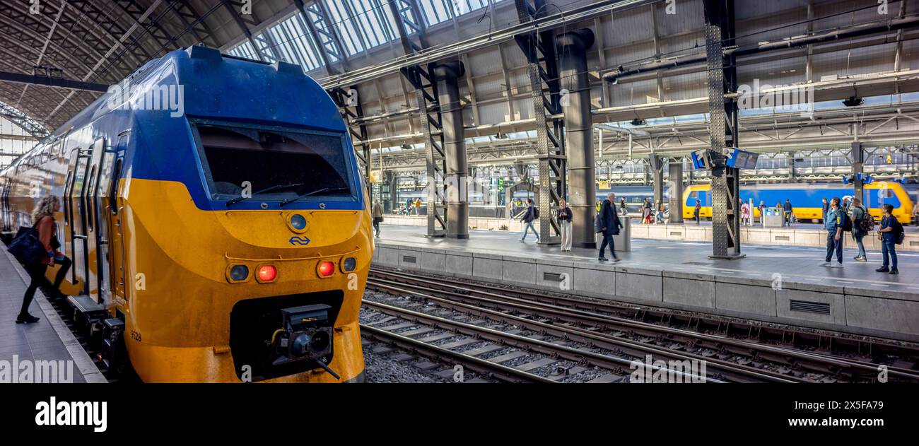 Central train station of Dutch railroad in capital city with large tube ...