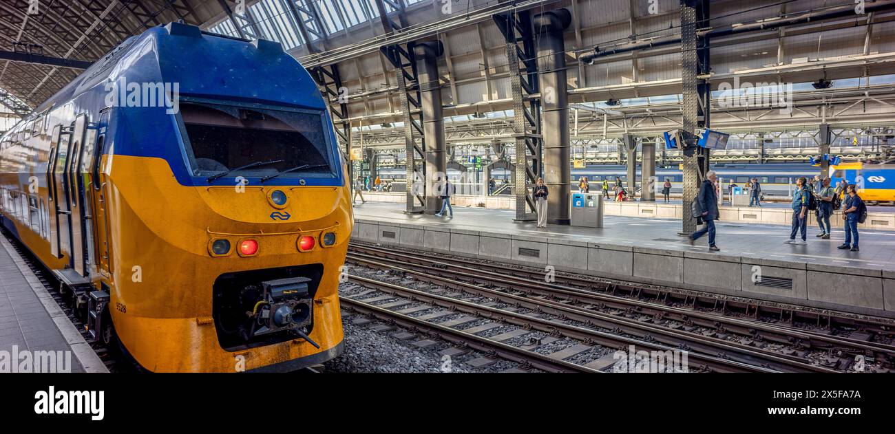 Central train station of Dutch railroad in capital city with large tube ...