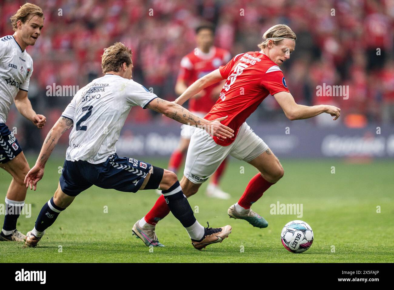 Denmark. 09th May, 2024. AGF's Felix Beijmo and Silkeborg IF's Stefan ...