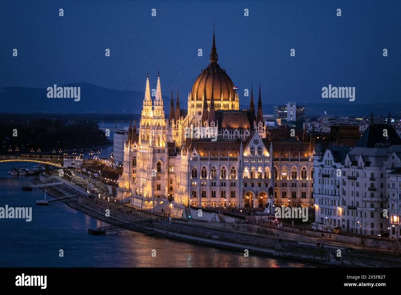 Budapest: Hungarian Parliament Building and Danube River at night ...