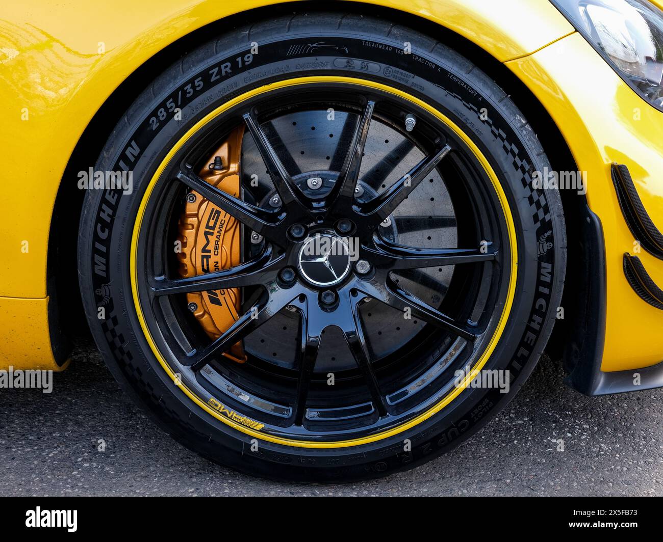 Prague, czech republic - Mar 3 2024: Black rim and tyre of yellow ...