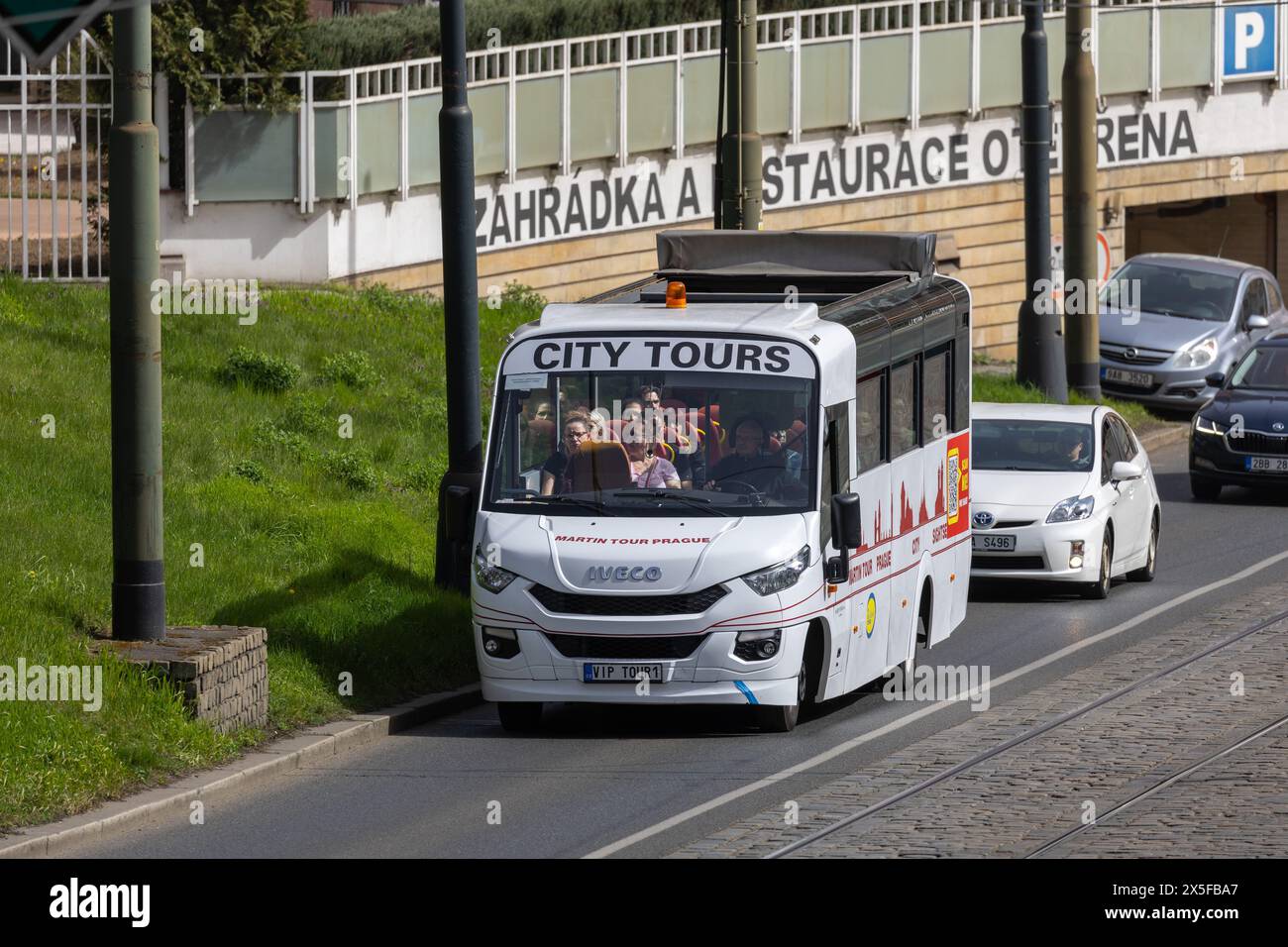 Prague, czech republic - Mar 3 2024: Tour bus with tourists driving on ...