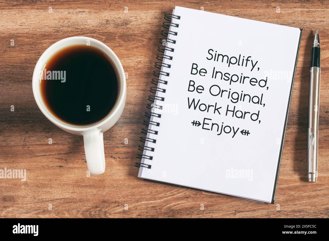 Notepad with inspirational text simplify, be inspired, be original ... Notepad with inspirational text simplify, be inspired, be original ...