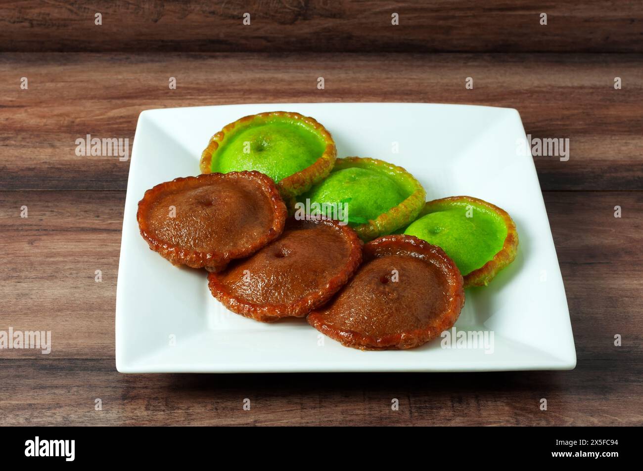 Mexican Hat dessert, Kuih Pinjaram or penyaram or cucur jawa on a plate ...