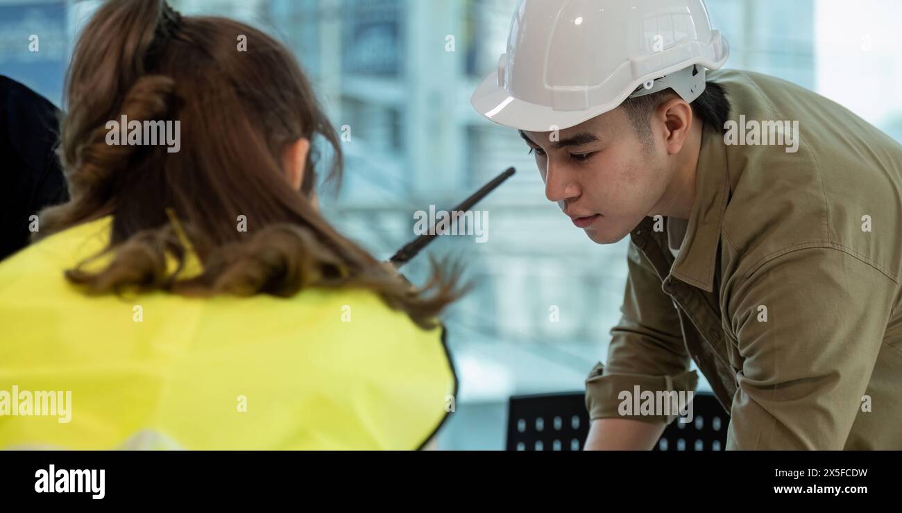 Teamwork in construction site, civil engineer or professional foreman ...