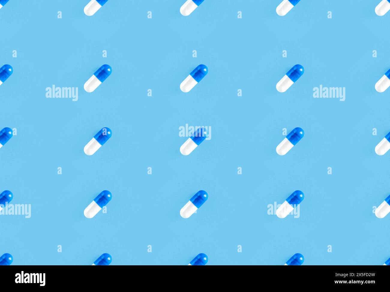 Two-piece pills on blue background. Medical pharmacy seamless pattern ...