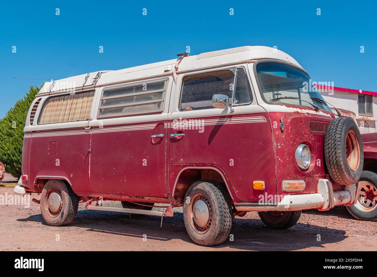 Holbrook, AZ, US-April 13 , 2024: Vintage 1960s bright red VW kombi ...