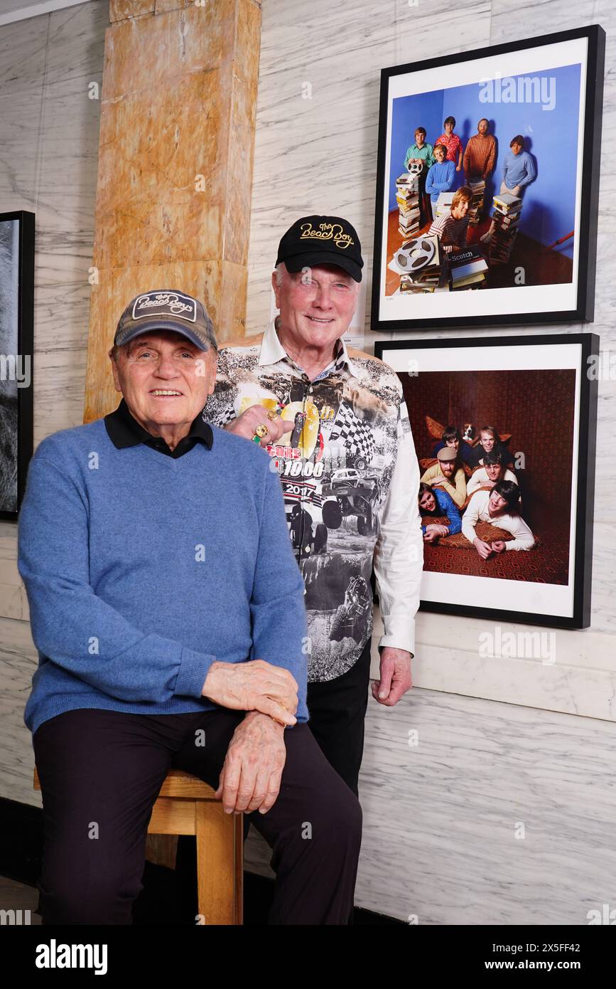 Bruce Johnson (left) and Mike Love at a reception and private view at ...