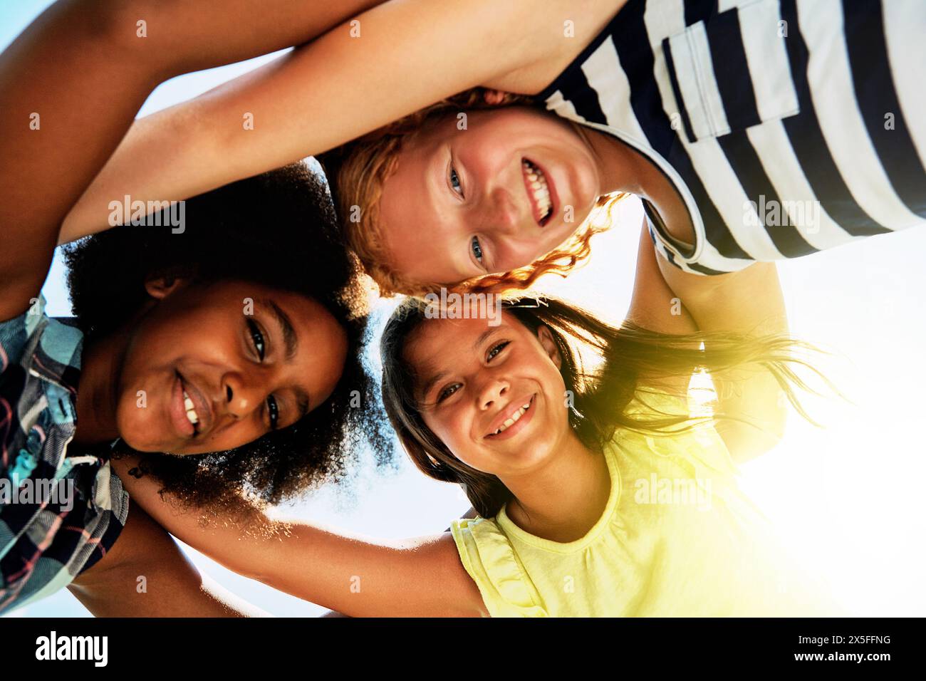 Happy, low angle and portrait of kids on camp for friendship, playing ...