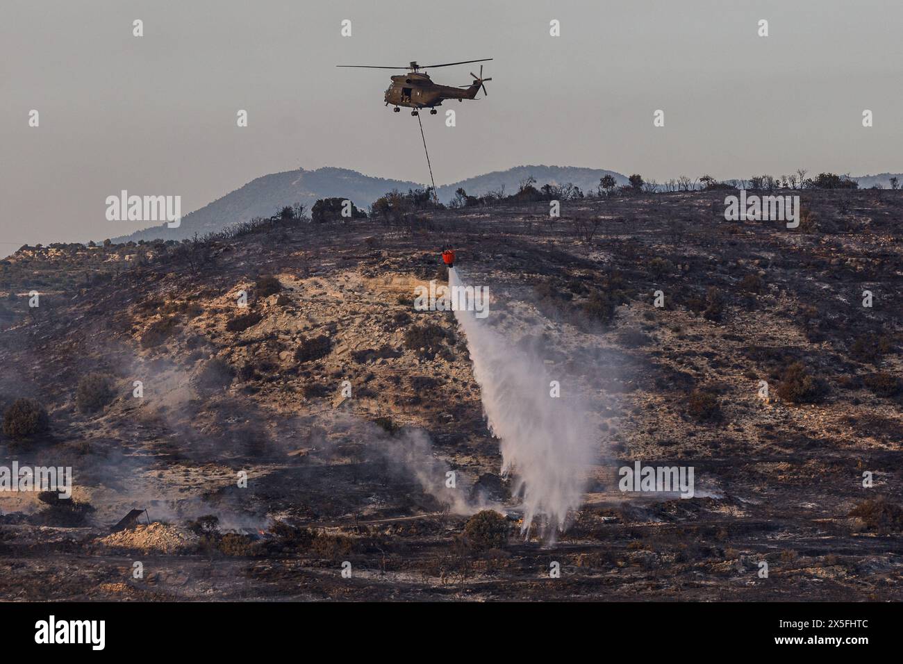 Limassol, Cyprus. 09th May, 2024. A helicopter is operating during the ...