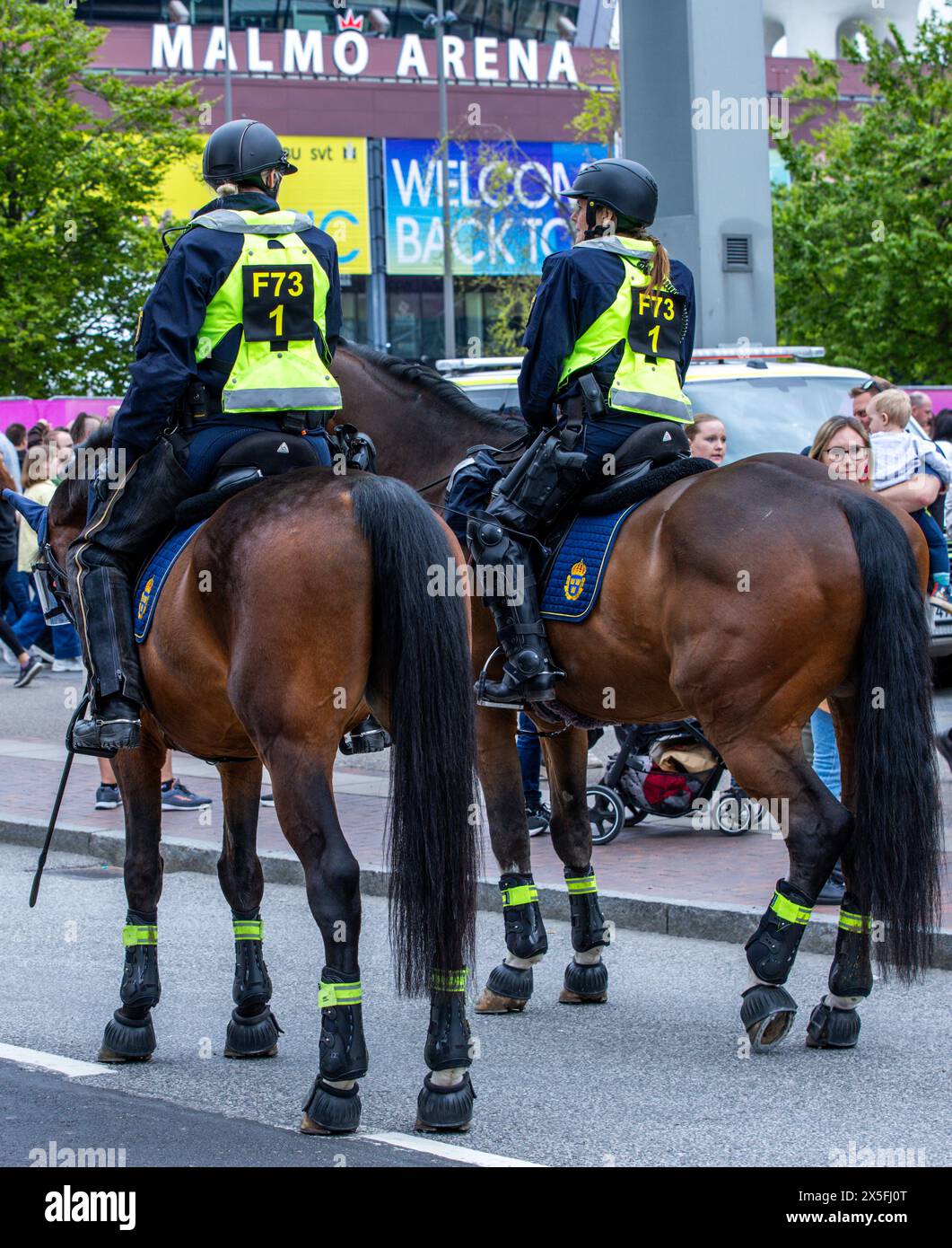 09 May 2024, Sweden, Malmö: Police officers on horseback secure the ...