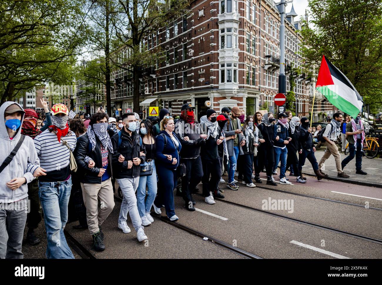 AMSTERDAM - Demonstrators during a protest near the Roeterseiland ...