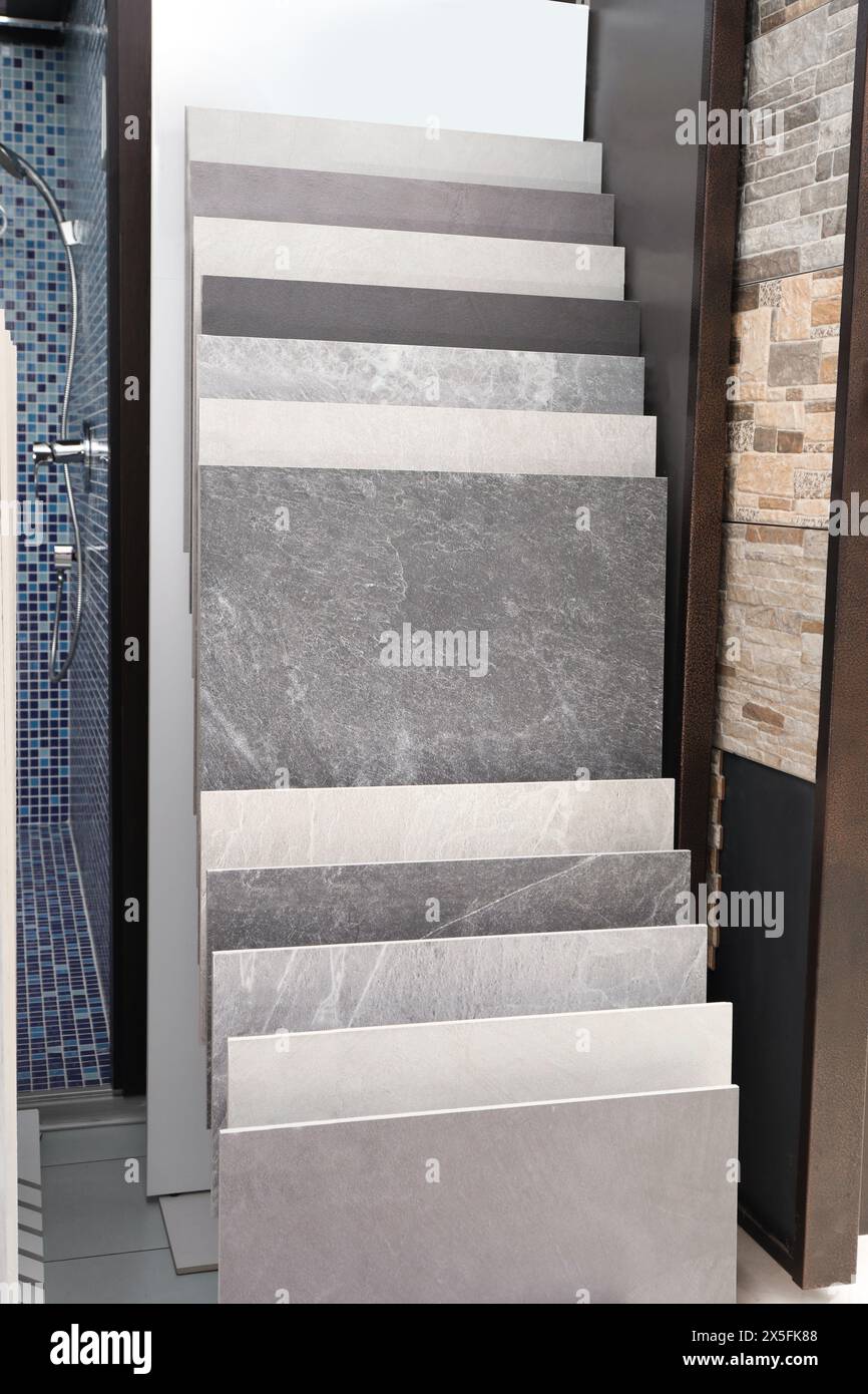 Many different samples of tiles on display in store Stock Photo - Alamy