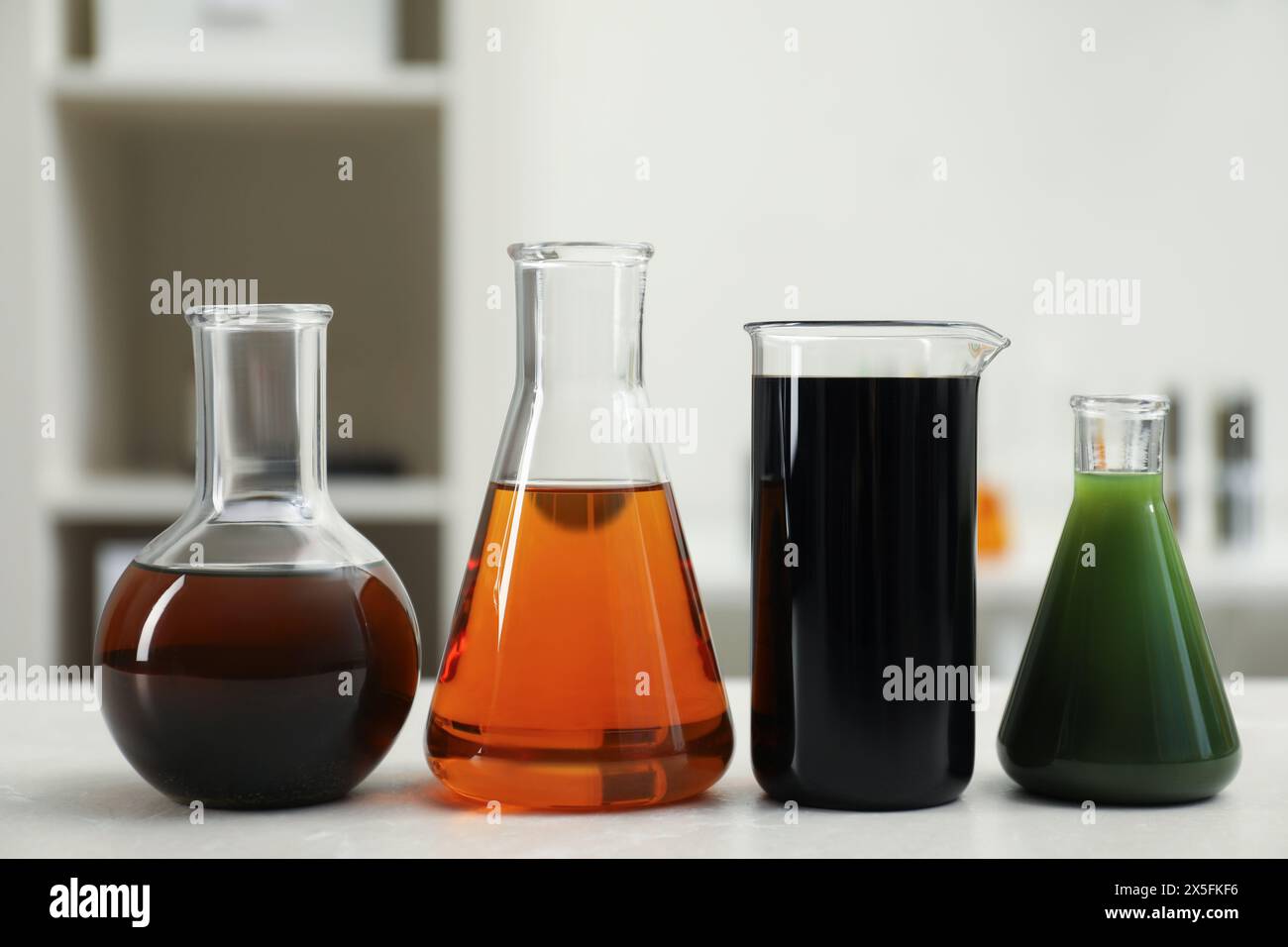 Lab beaker orange hi-res stock photography and images - Alamy