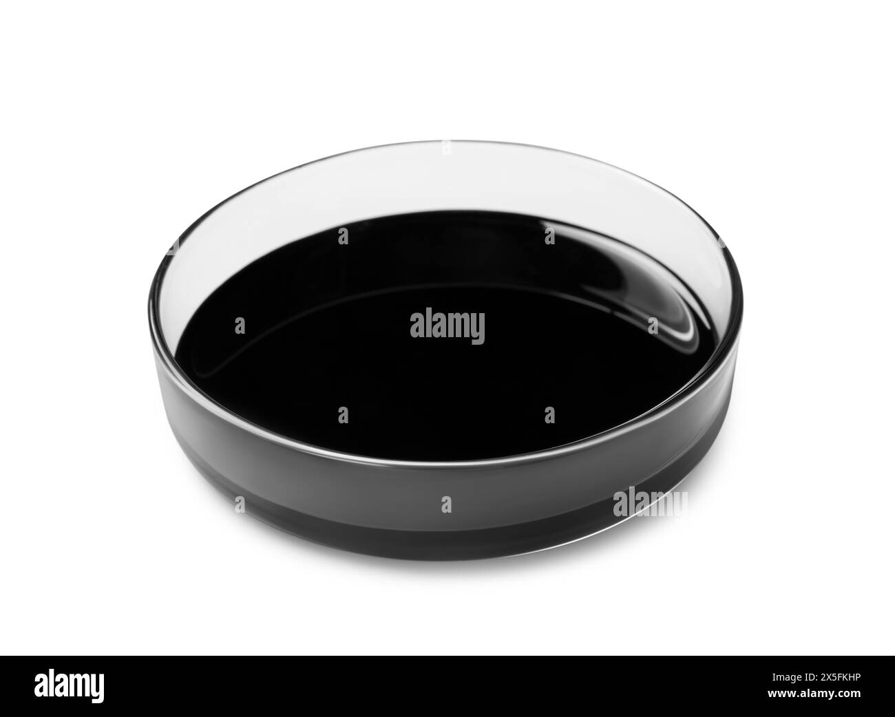 Black crude oil in Petri dish isolated on white Stock Photo - Alamy
